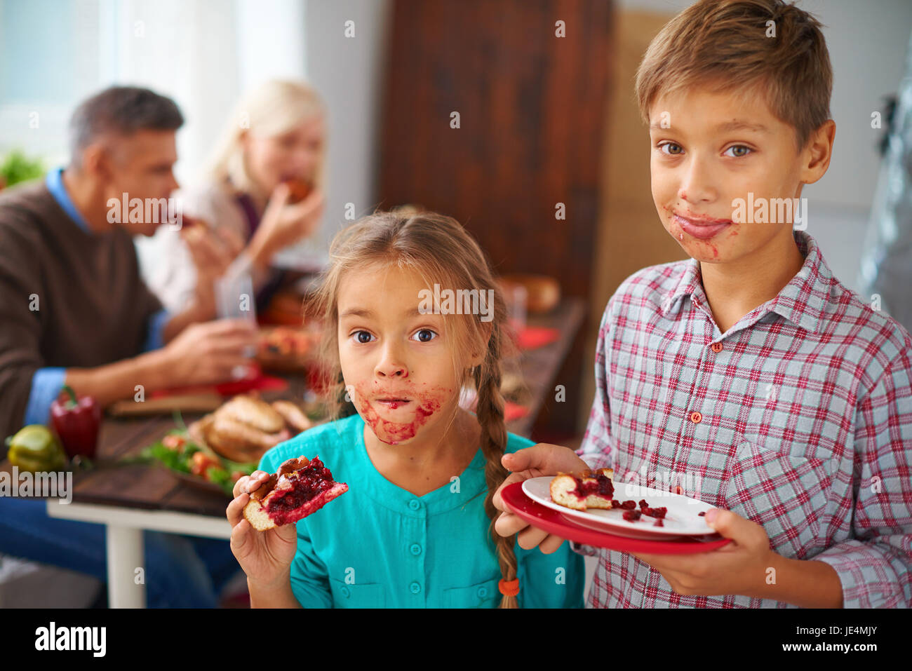 Kids background parents foreground hi-res stock photography and images ...