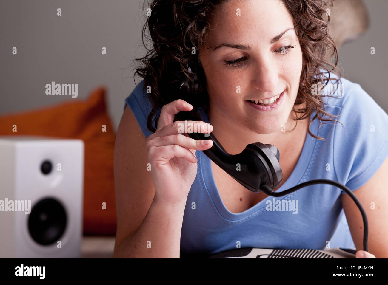 young woman chatting and doing gossip in her room Stock Photo - Alamy