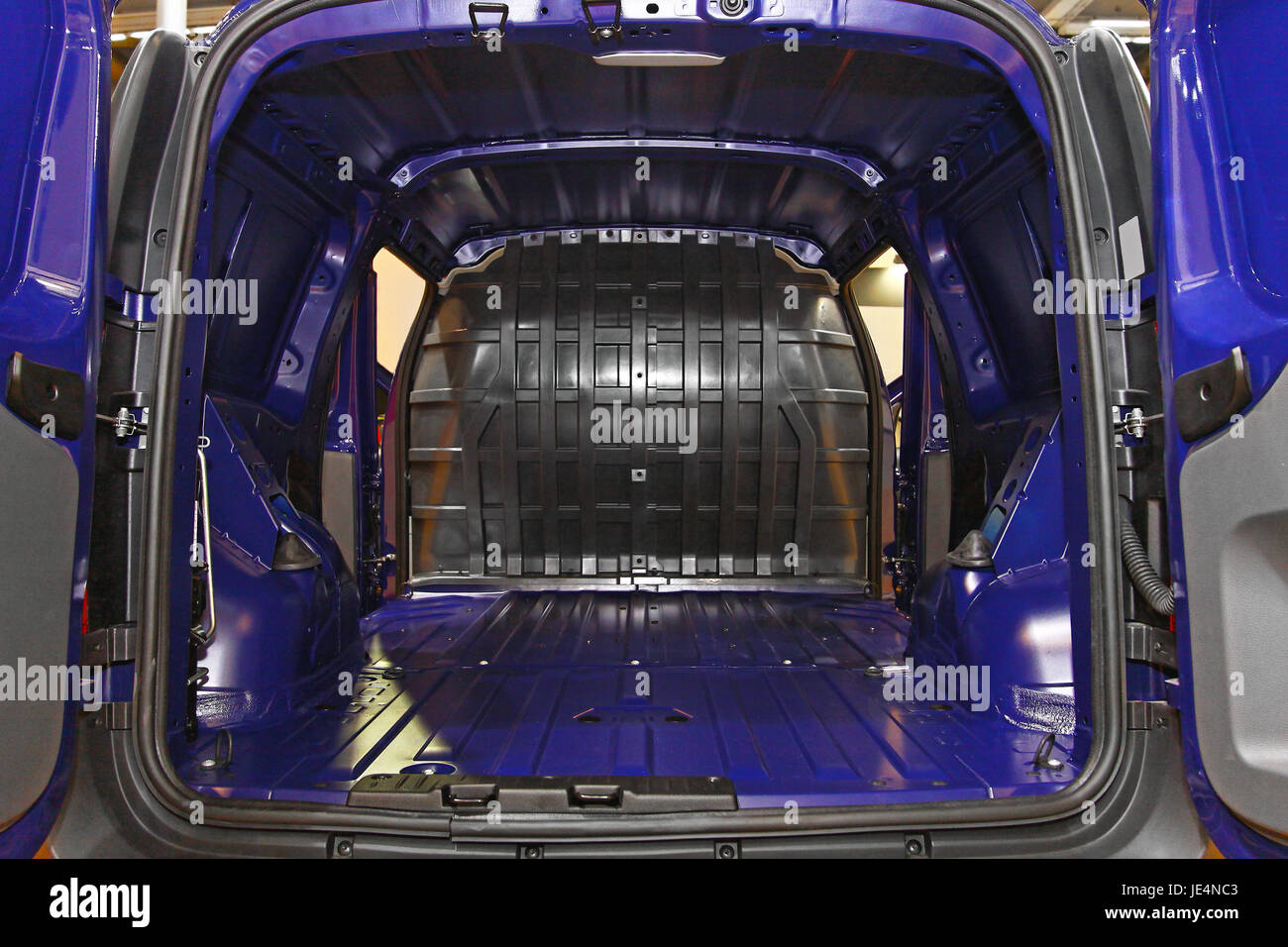Rear view of empty delivery van cargo space Stock Photo - Alamy