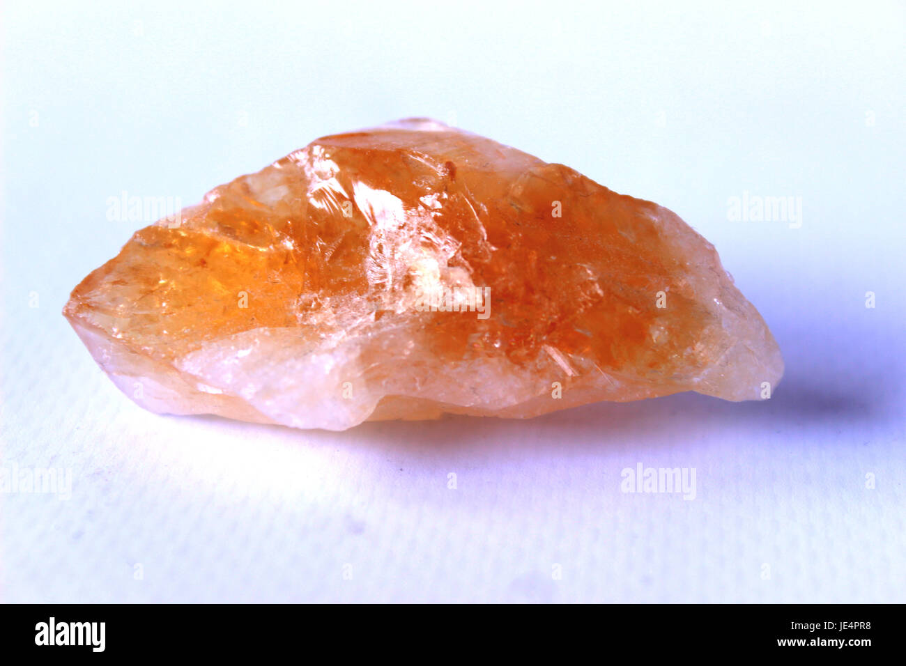 natural energy stone yellow on white background Stock Photo - Alamy