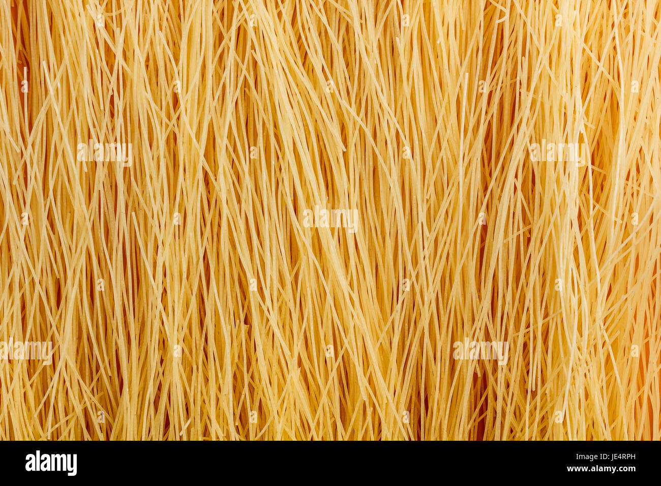 Italian filini pasta, raw food background Stock Photo - Alamy