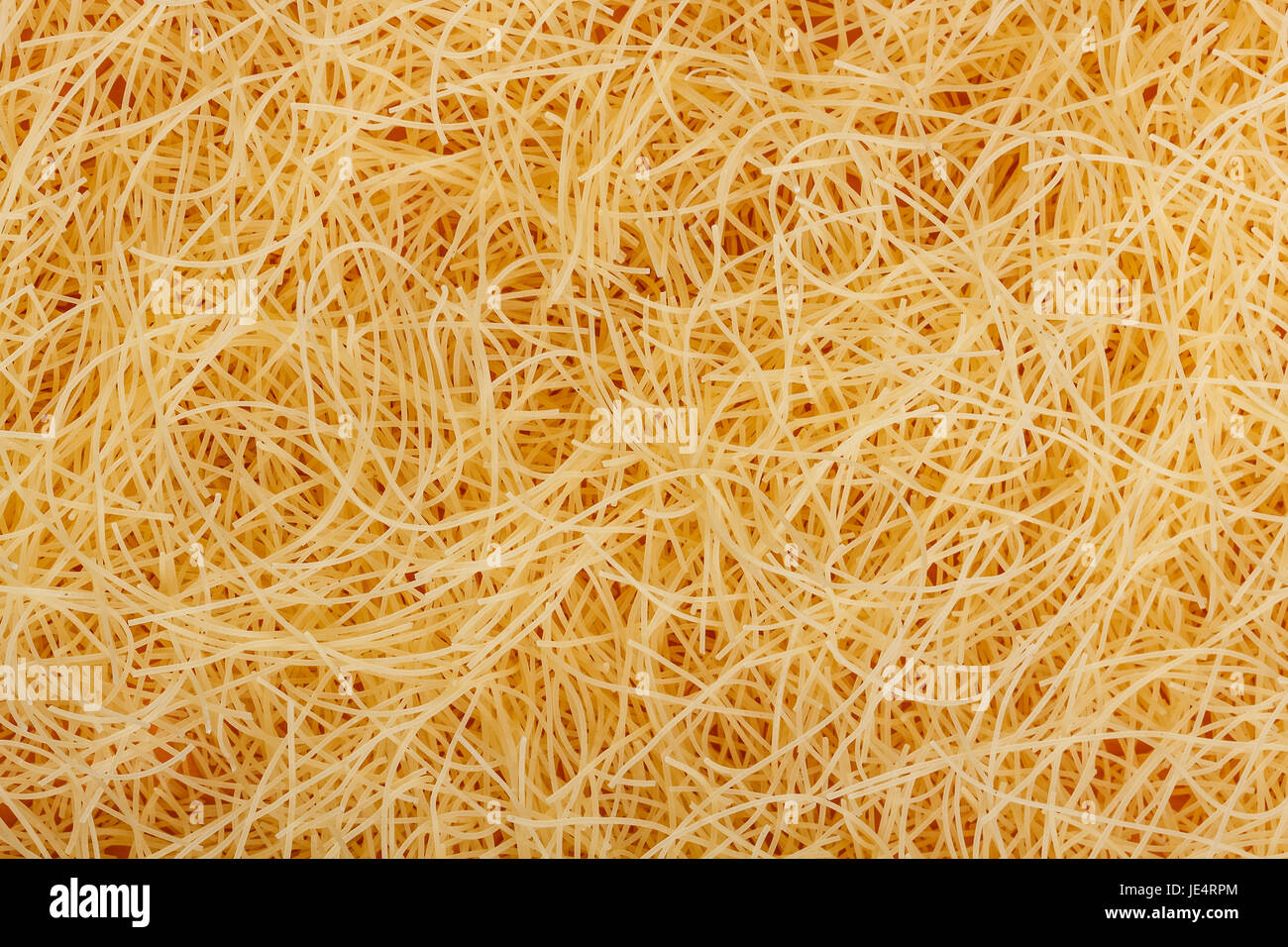 Italian filini pasta, raw food background Stock Photo - Alamy