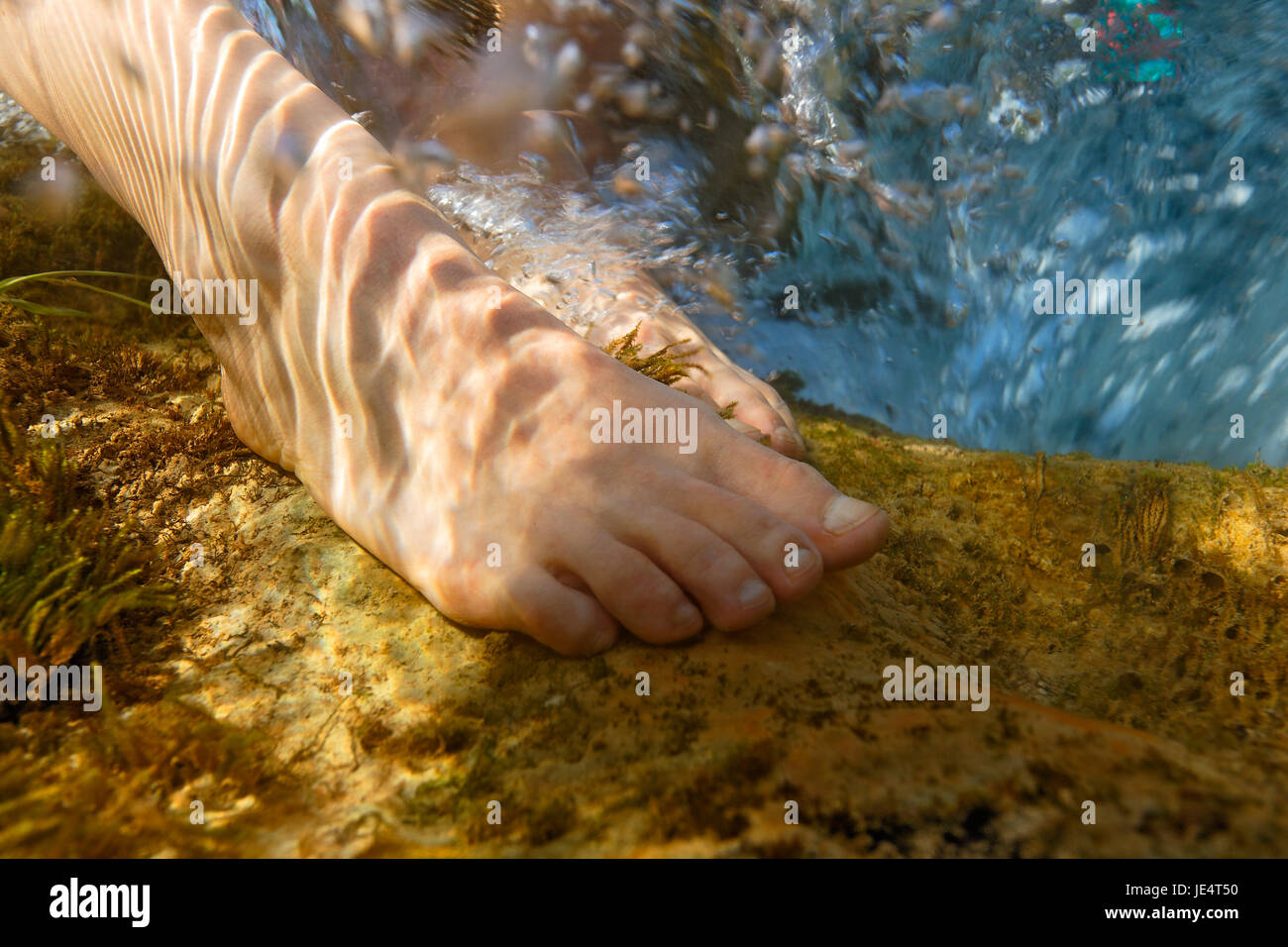 Female leg in the waterfall, the Mrežnica River, Croatia Stock Photo ...