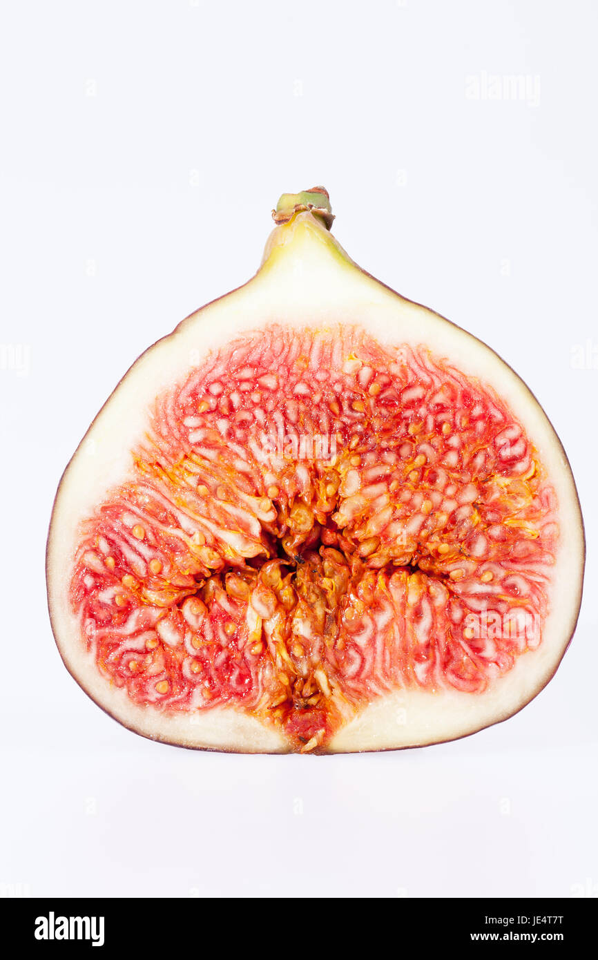 fruit of sectioned fresh fig isolated on white background Stock Photo ...