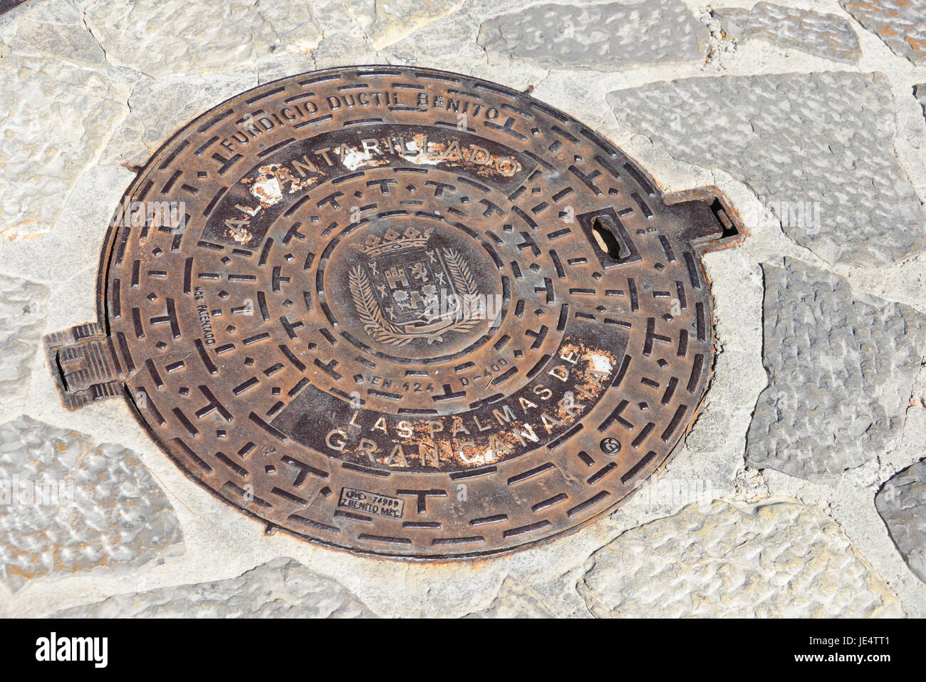 spain,paving stones,paving - gully cover Stock Photo - Alamy