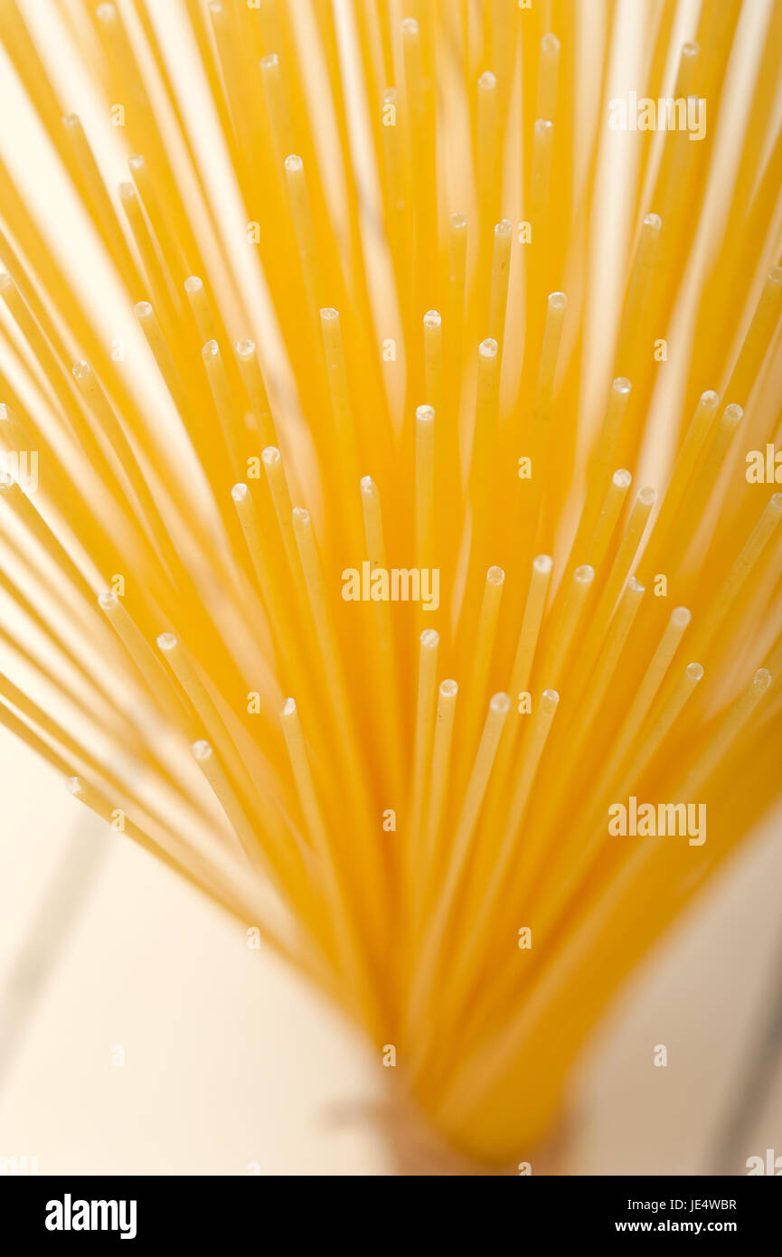 Italian pasta spaghetti tied with a rope on a rustic table Stock Photo ...