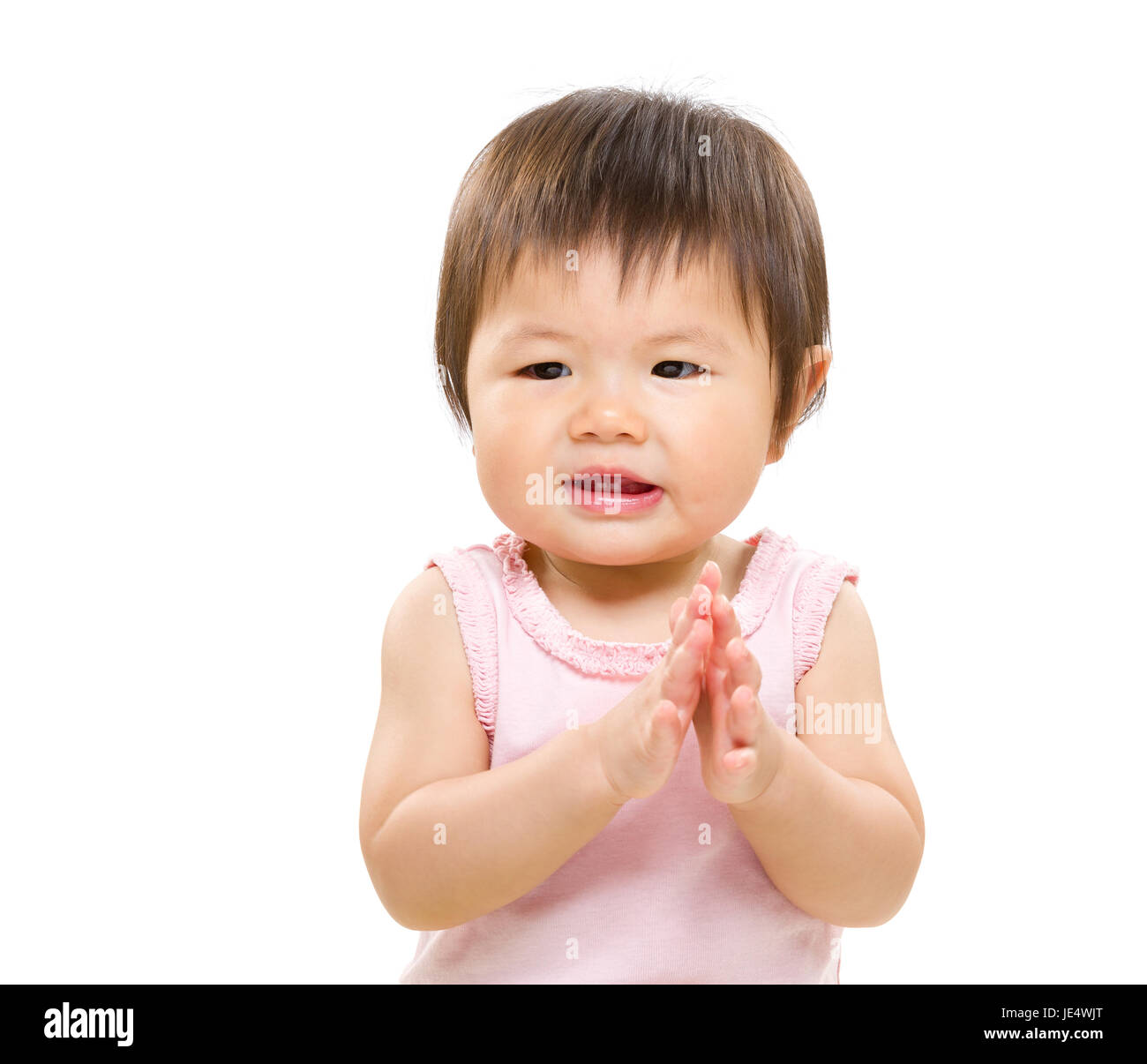 Asian baby girl clapping hand Stock Photo - Alamy