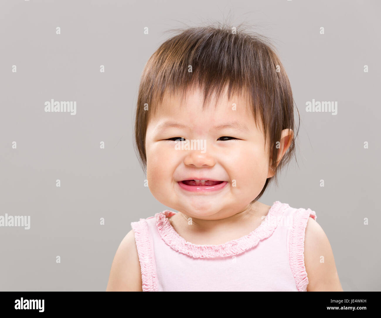 Smiling baby girl Stock Photo - Alamy