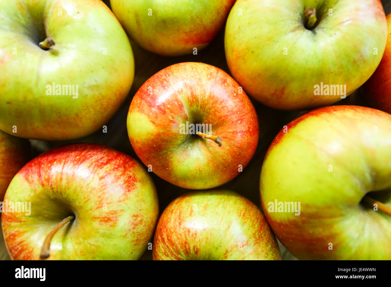 Food: Champion apples - whole and cut Stock Photo - Alamy