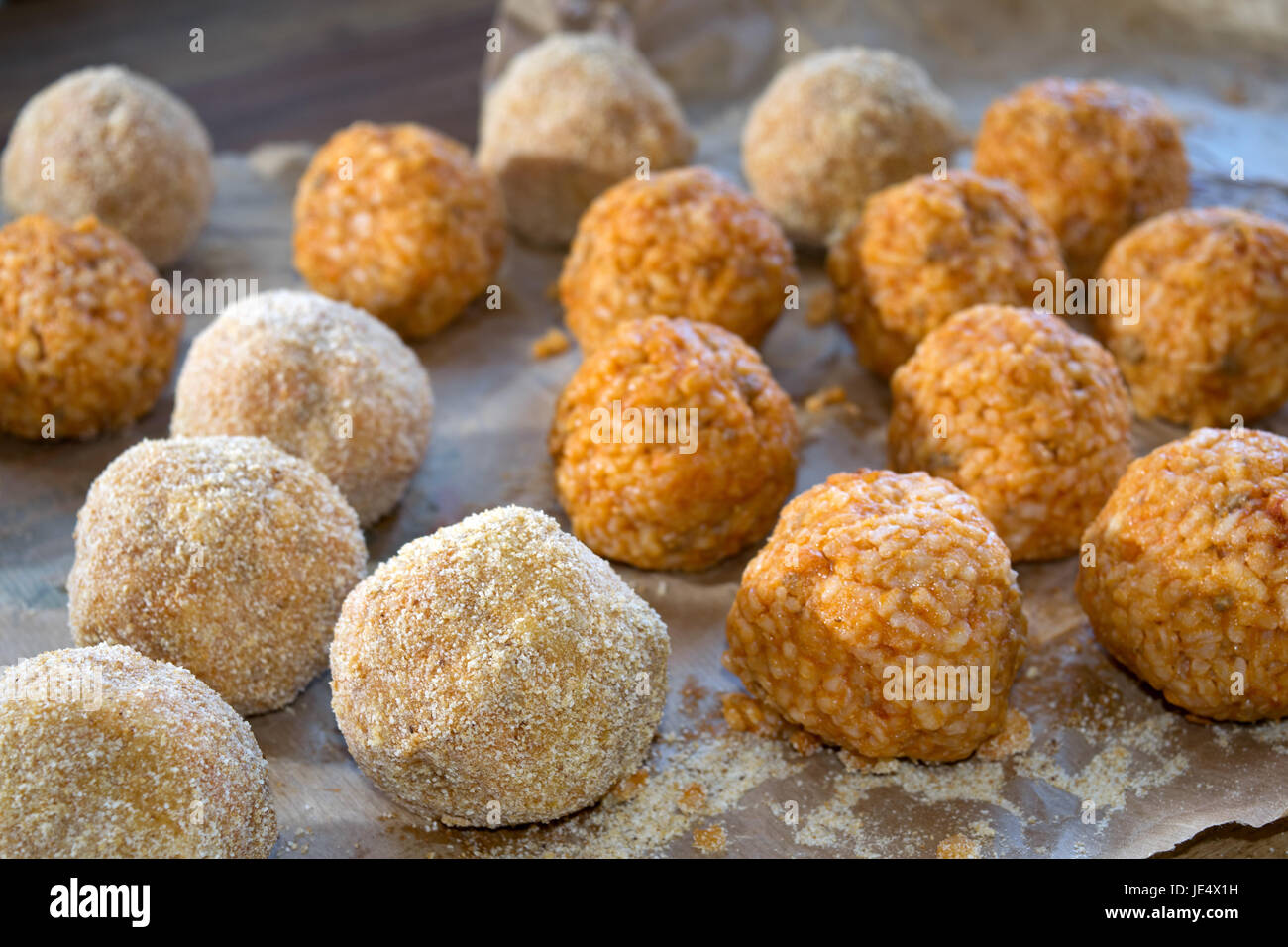 Sicilian rice croquette ready to be cooked Stock Photo - Alamy