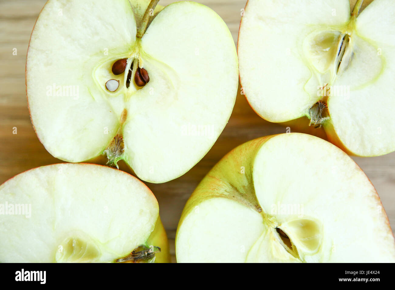 Food: Champion apples - whole and cut Stock Photo - Alamy