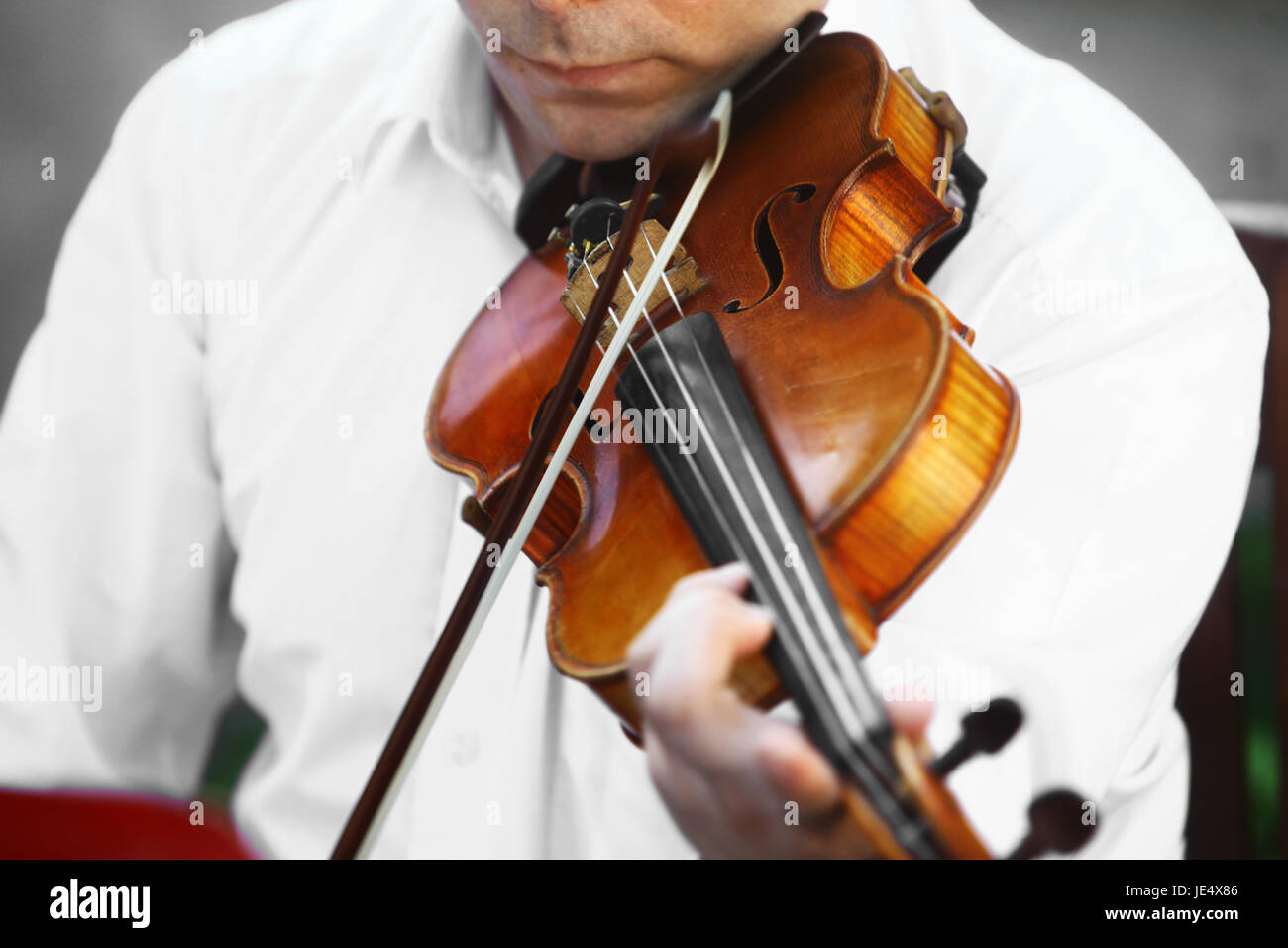 Detail of violin being played by a musician Stock Photo - Alamy