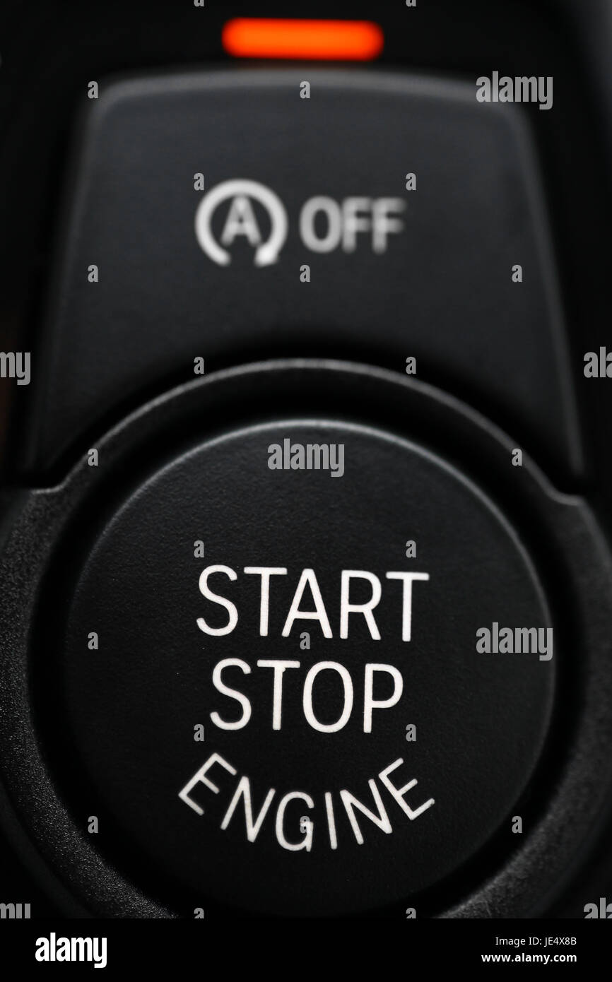 Detail on a black start button in a car Stock Photo - Alamy