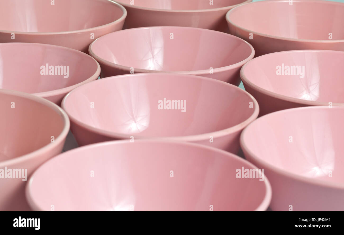 Empty plastic bowls on isolated white background Stock Photo - Alamy