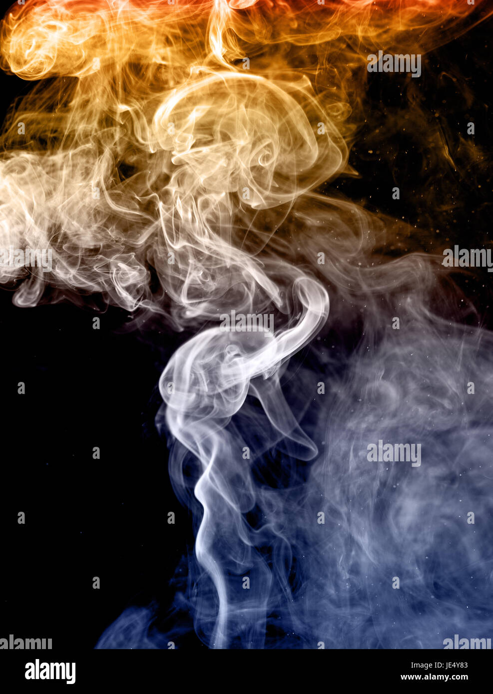 Yellow and blue smoke Stock Photo - Alamy