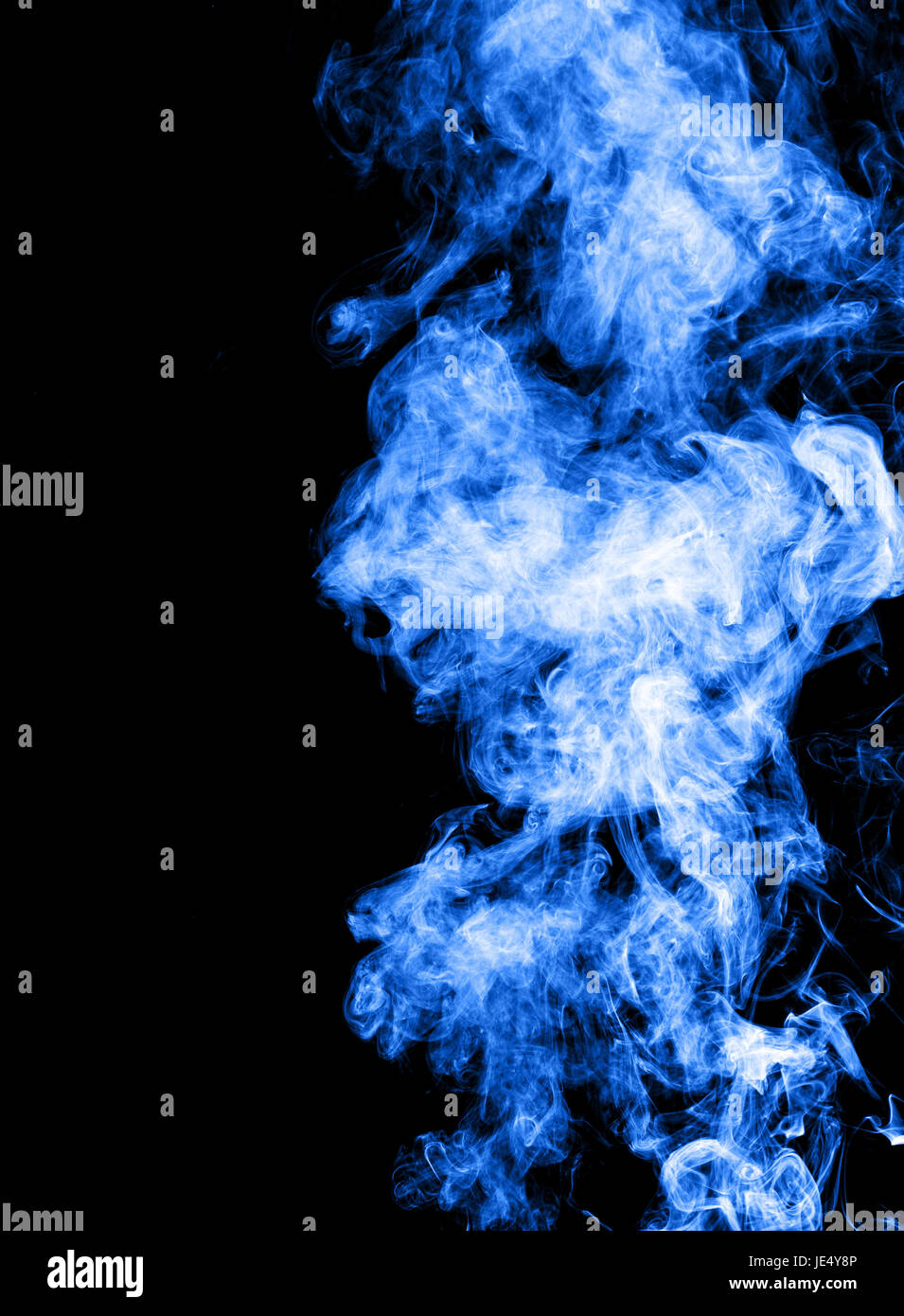 Smoke in blue color Stock Photo - Alamy
