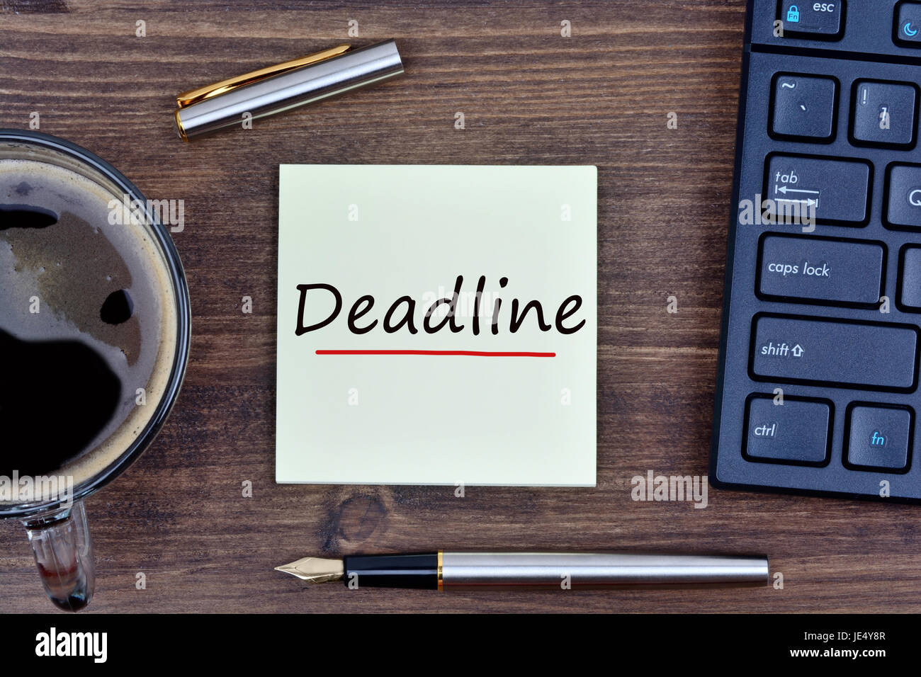 Deadline word on notes closeup Stock Photo - Alamy