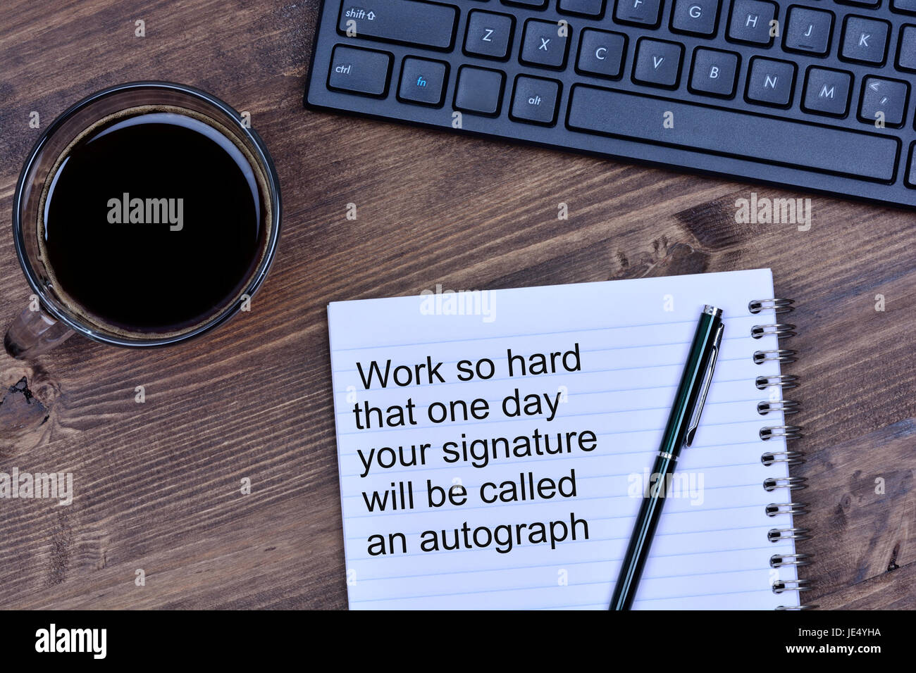 Inspirational quote on notebook page Stock Photo - Alamy
