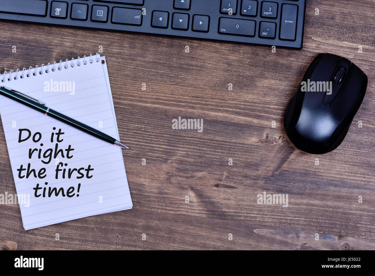 Text Do it right the first time on notepad page Stock Photo - Alamy