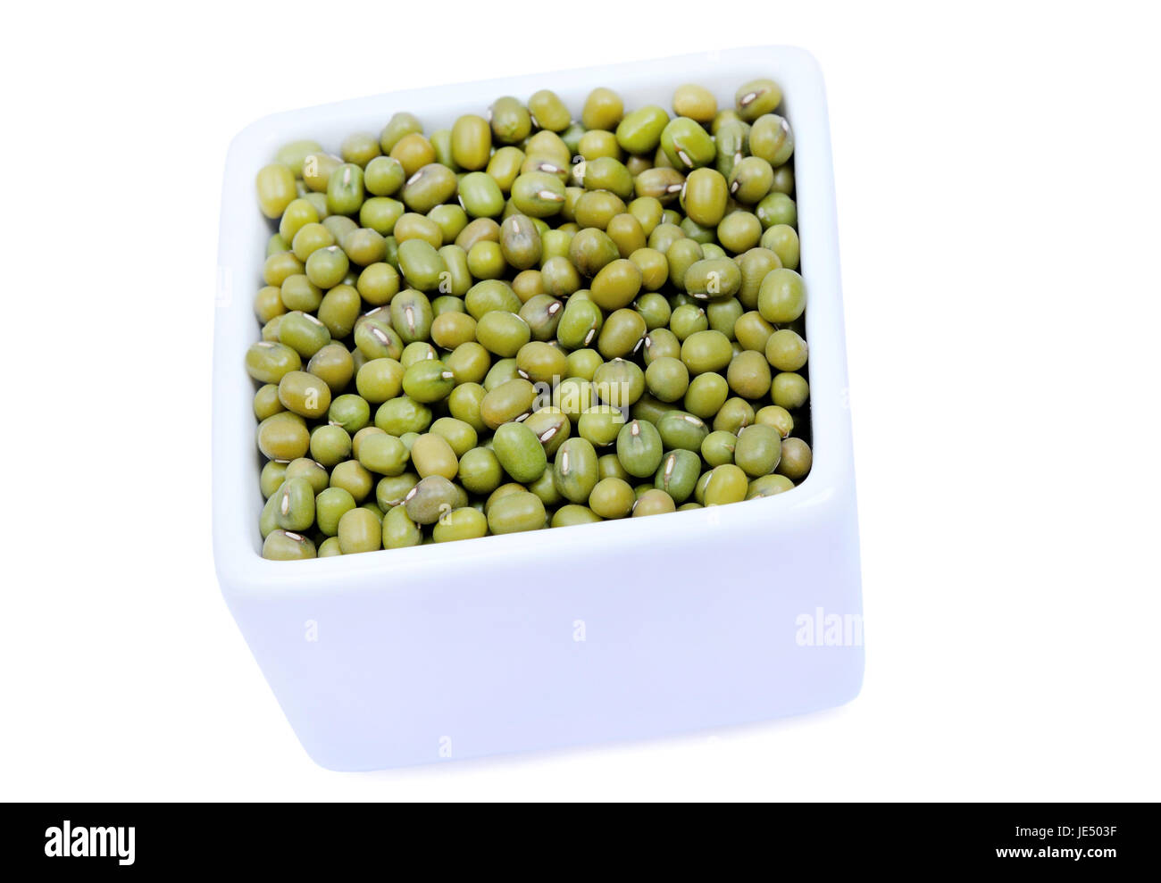 Isolated mung beans in a bowl on white background Stock Photo - Alamy