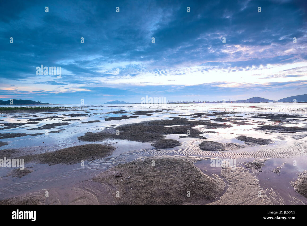 sunset shingle coast in hong kong Stock Photo - Alamy