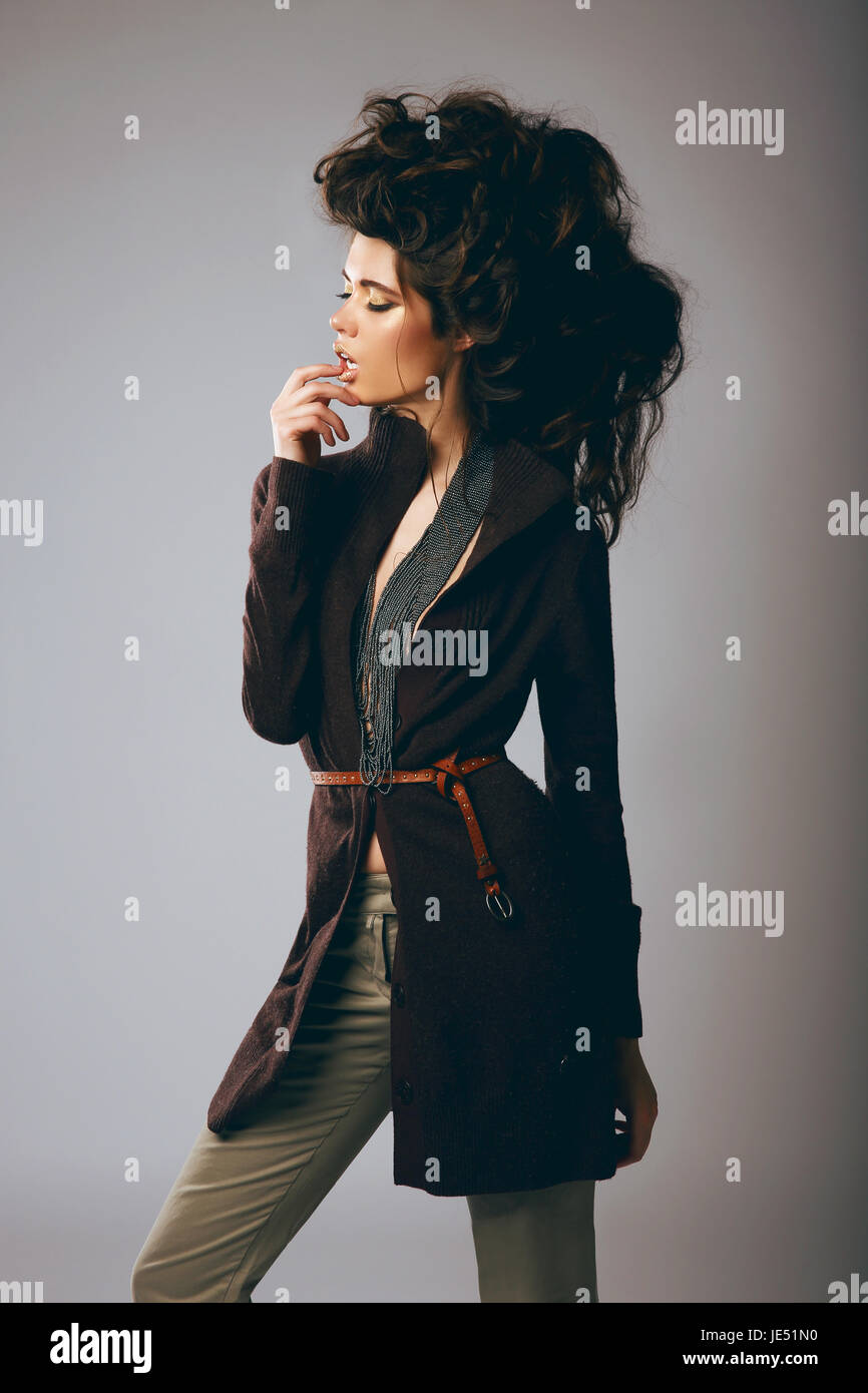 Vogue Style. Classy Fashion Model in Stylish Brown Jacket and Pants ...