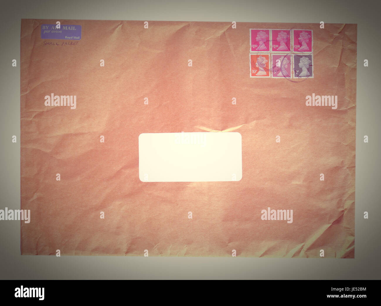 Vintage looking mail letter envelope Stock Photo - Alamy