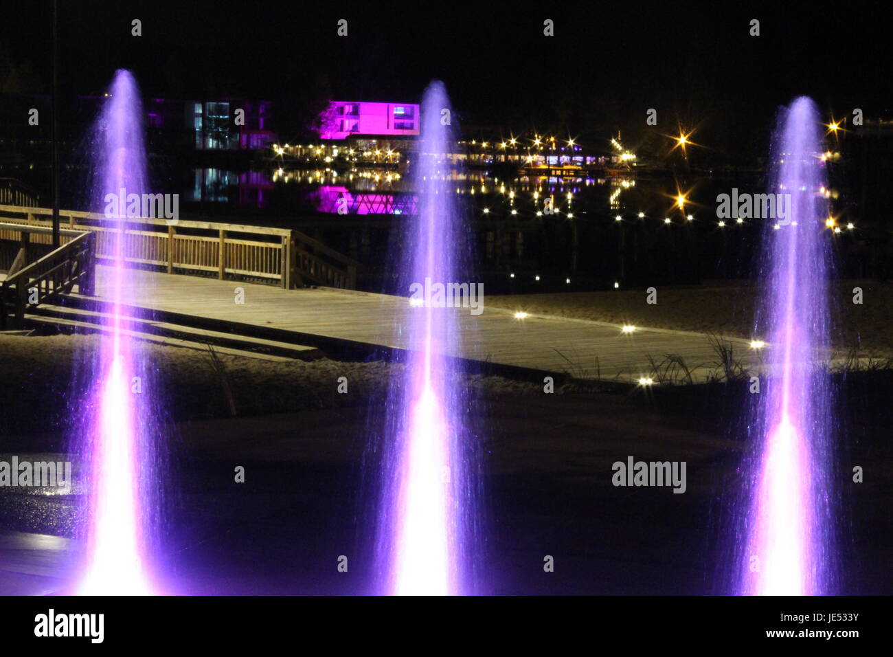 water features with background architecture at night Stock Photo - Alamy