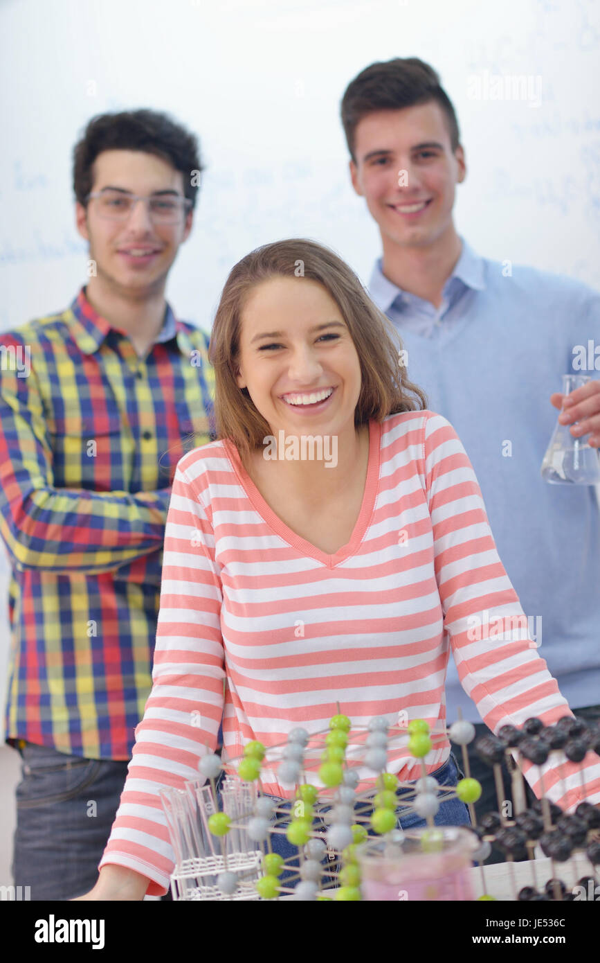 happy young teens group in school have fun an learning lessons Stock ...