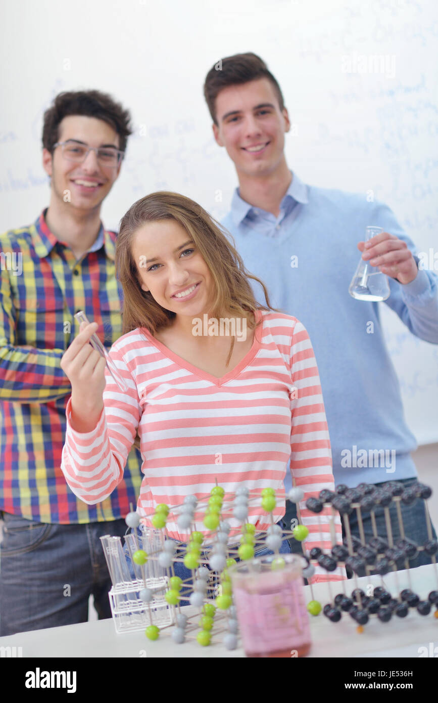 happy young teens group in school have fun an learning lessons Stock ...