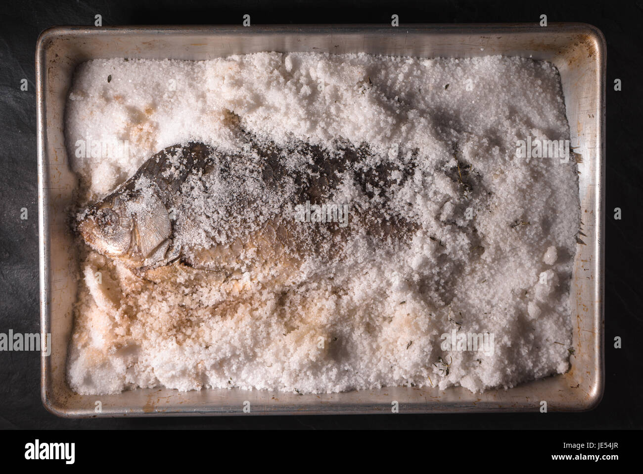 Fish baked in salt on the stone background top view horizontal Stock ...