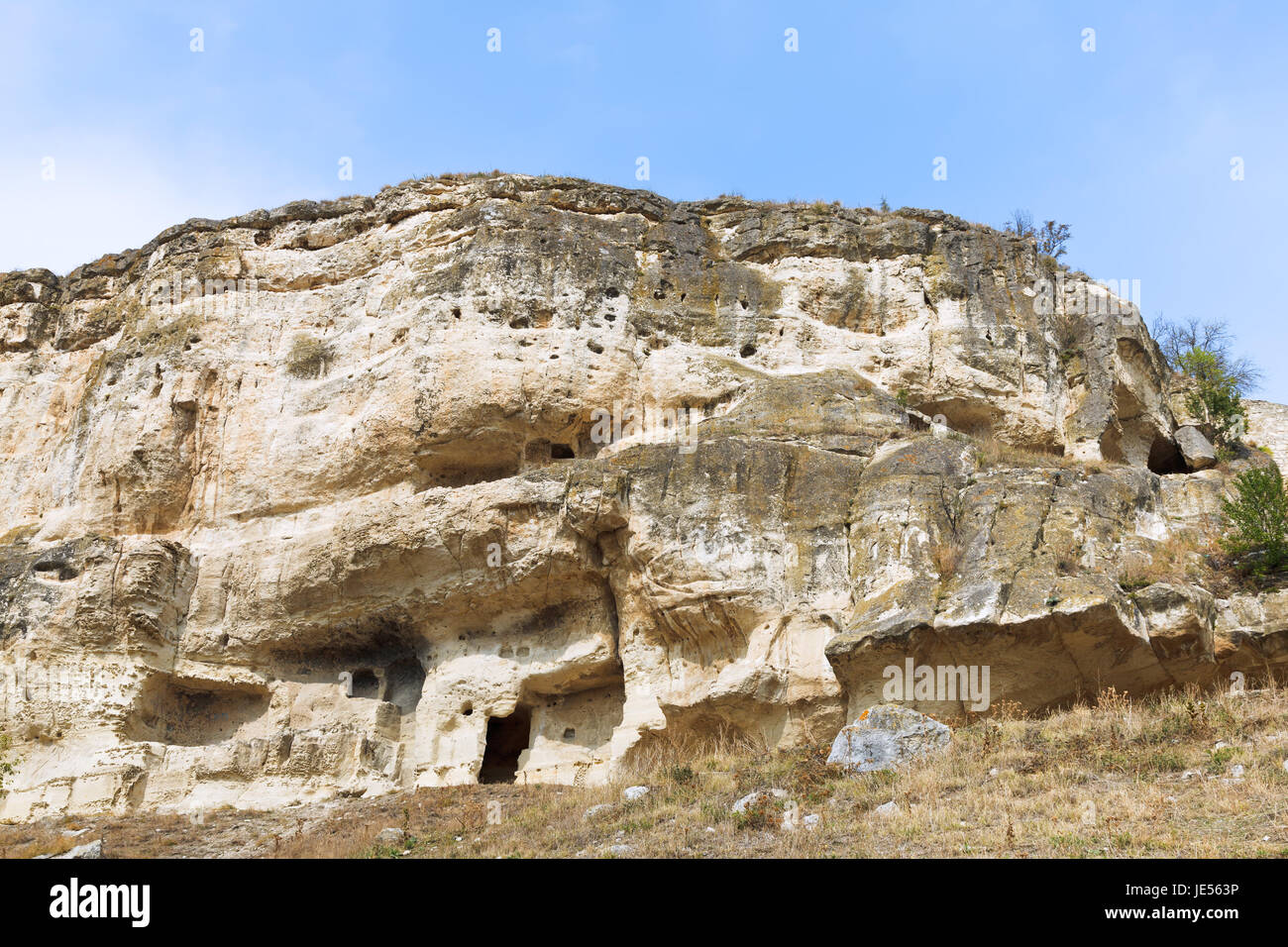 Caves of medieval town chufut-kale on mountain in Crimea Stock Photo ...