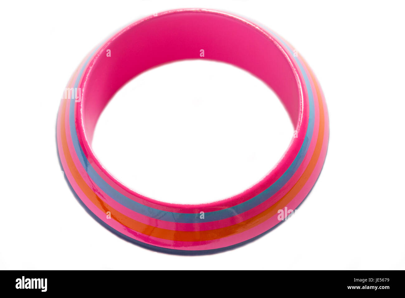 Pink bangle with orange and blue stripes isolated on white background ...