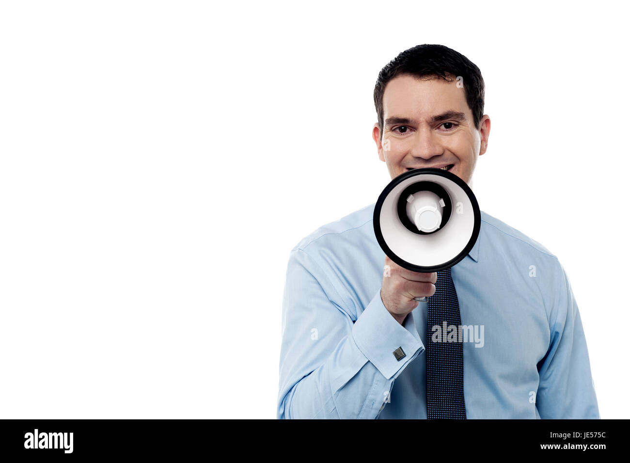 Happy man making announcement over a megaphone Stock Photo - Alamy