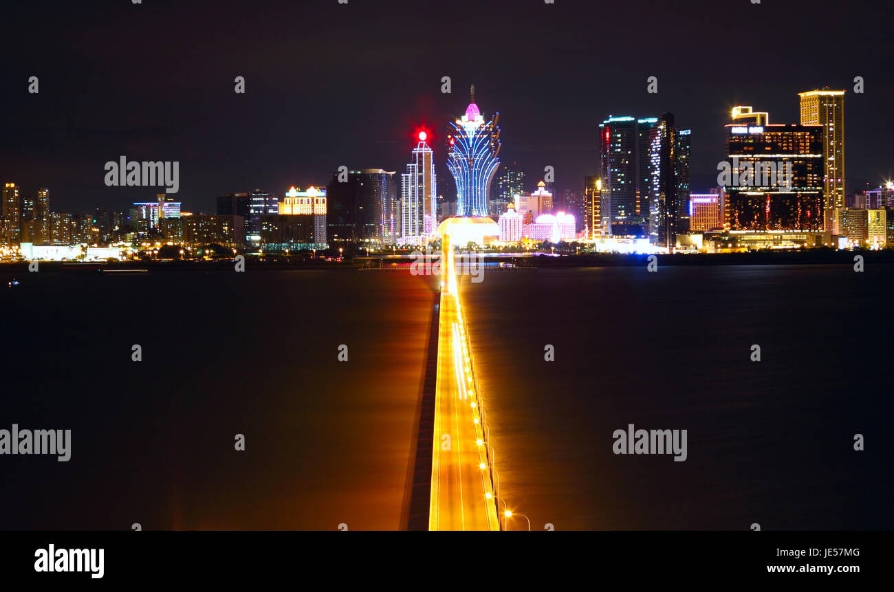 Macao cityscape with famous landmark of casino skyscraper and bridge ...