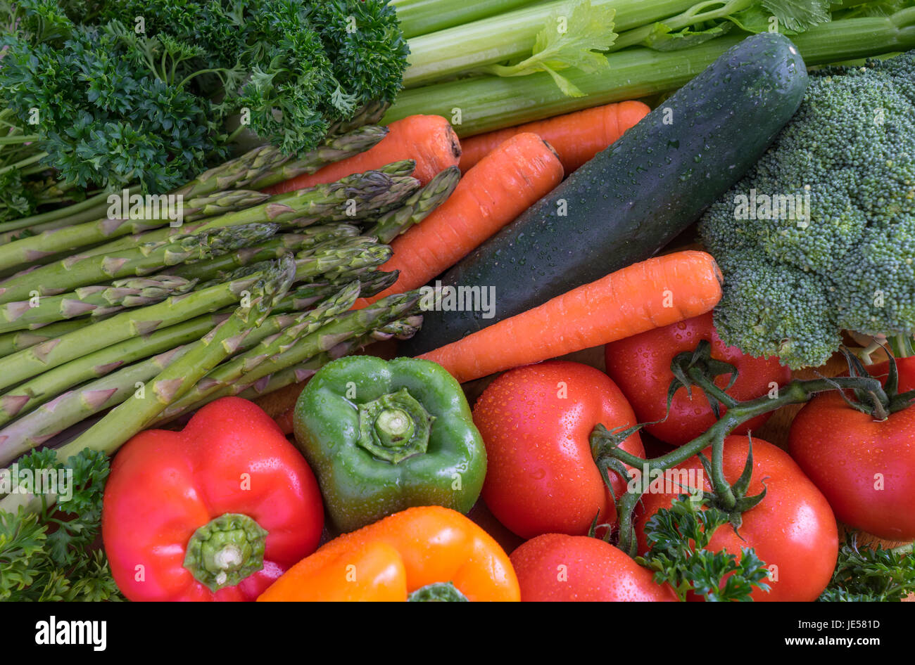 Fresh raw vegetables - tomatoes, peppers, carrots, broccoli, asparagus ...