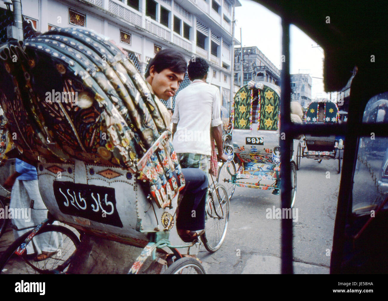 Reportage Bangla Desh 1980. Dhaka, rickshaw traffic Stock Photo - Alamy