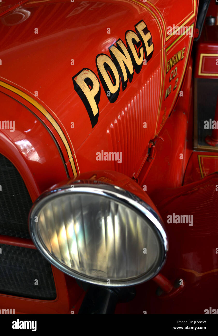 An antique fire engine sits in the main fire station in Ponce, Puerto ...