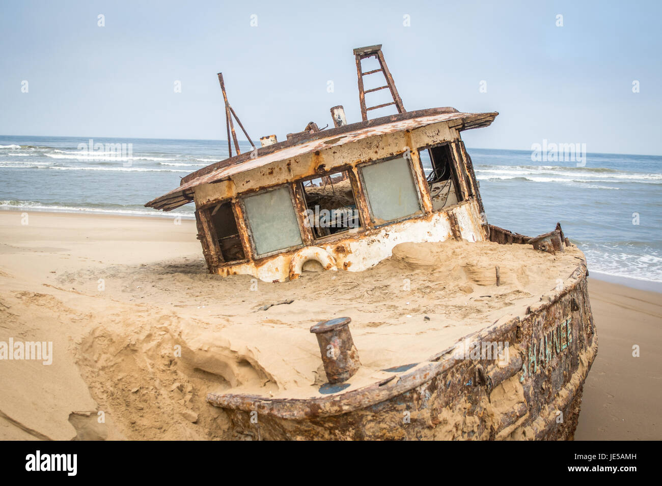 Stranded boat at the coast of the Namibian Desert, Namibia Stock Photo ...