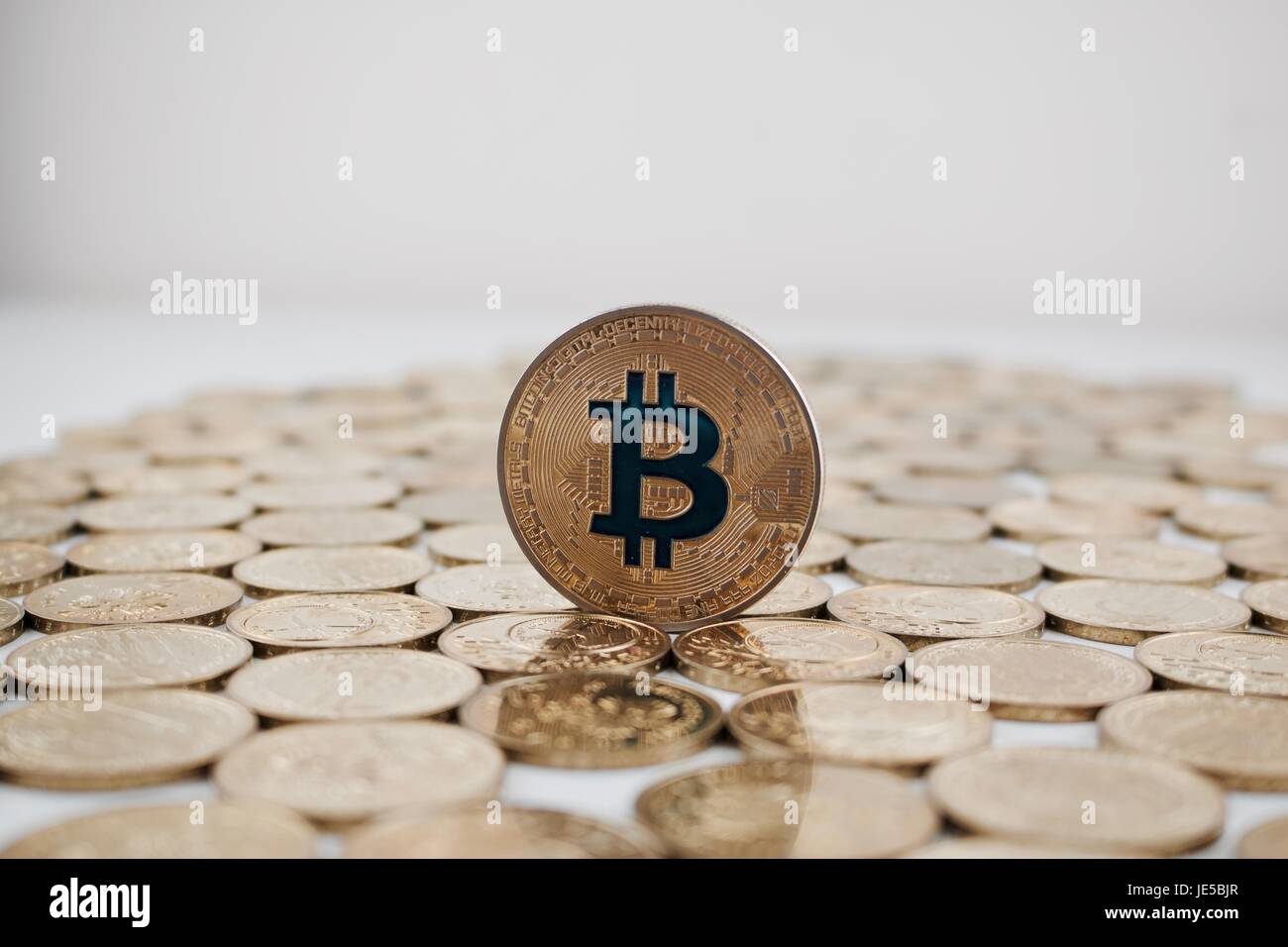 Digital currency physical gold bitcoin coin on gold money Stock Photo ...