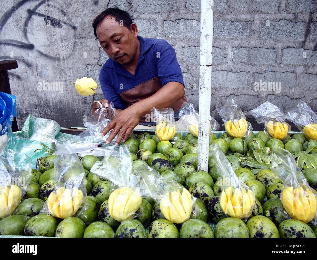 Street sidewalk cut fruit vendor selling hi-res stock photography and ...