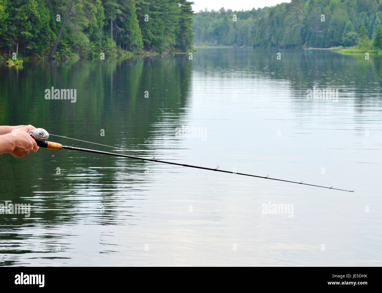 Fisherman lake water fishing hi-res stock photography and images - Alamy