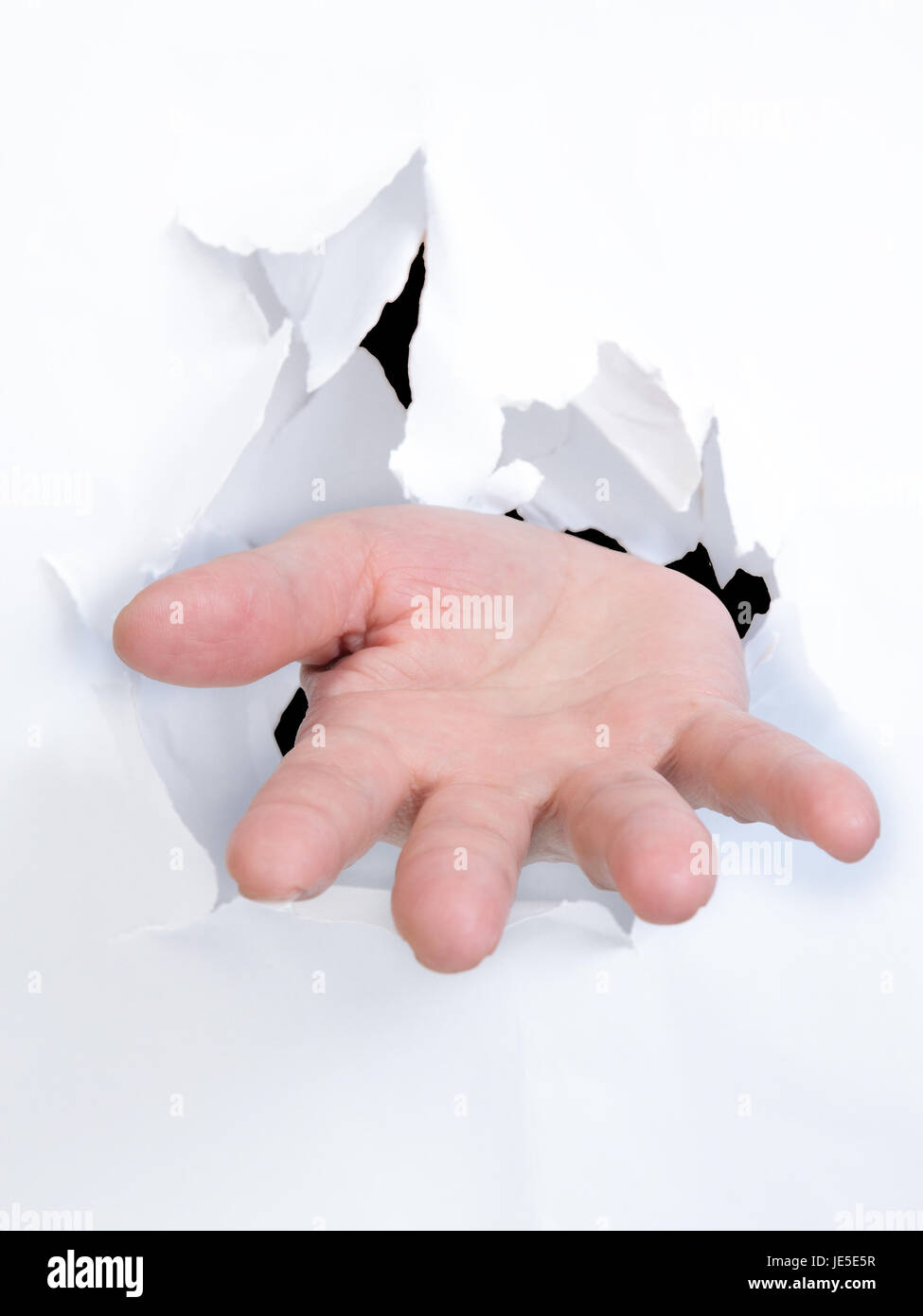 hand broken the paper making sign Stock Photo - Alamy