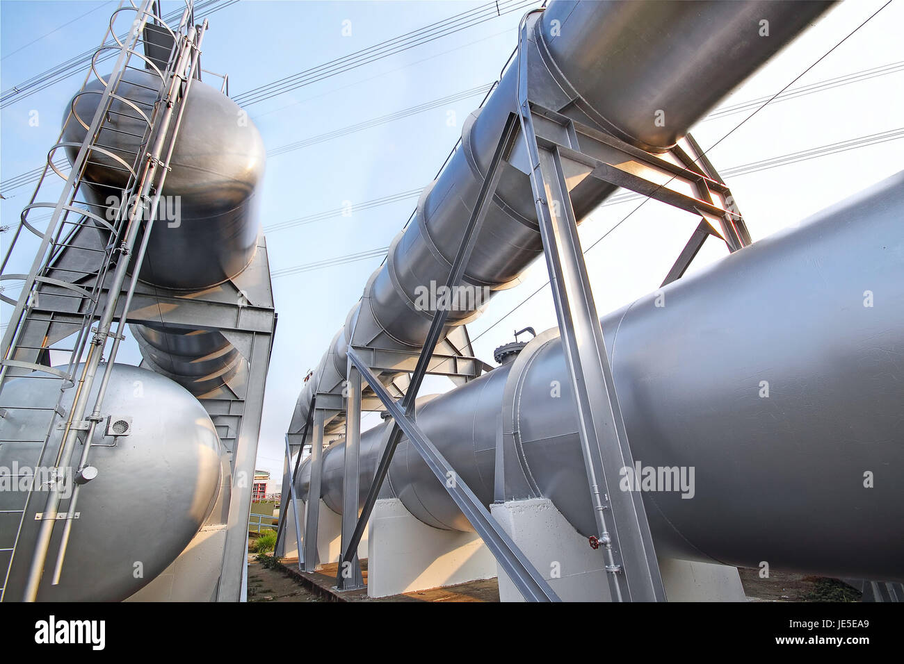 Big gas container against the blue sky Stock Photo - Alamy