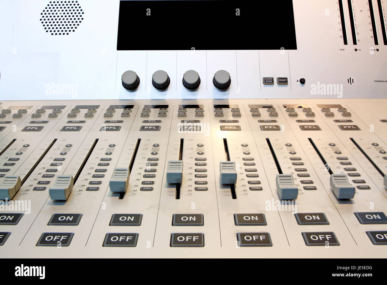 Part of an audio sound mixer with buttons Stock Photo - Alamy