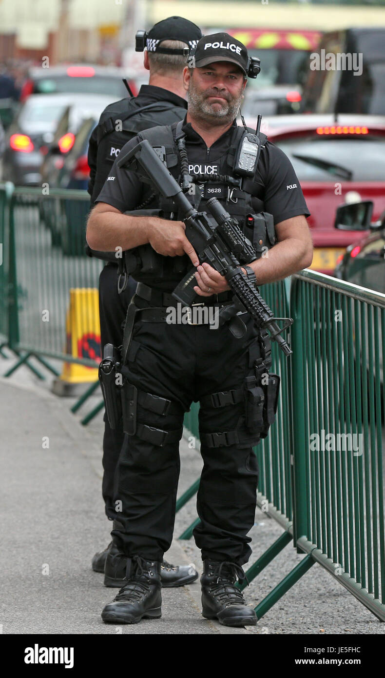Armed police stand guard outside during day three of Royal Ascot at ...