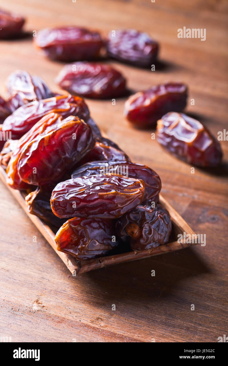 Juicy dates on old wooden hi-res stock photography and images - Alamy