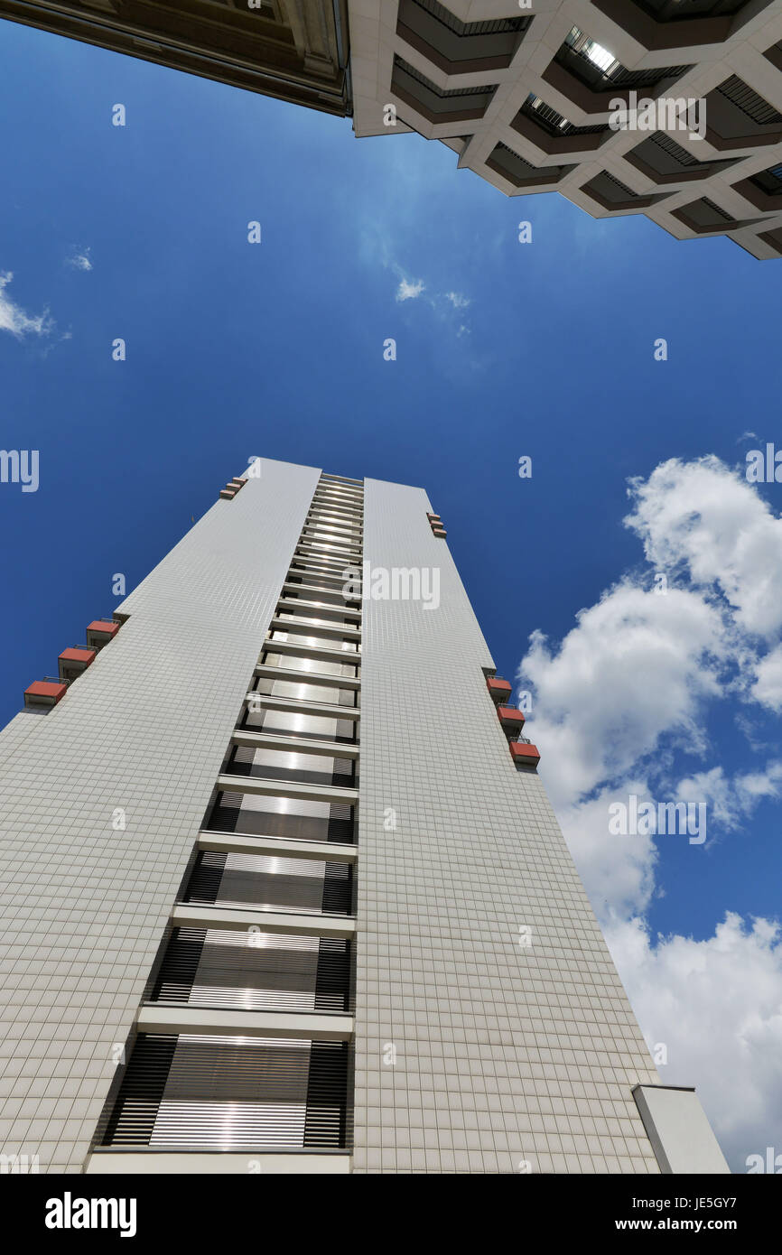 The facade of a high building with some windows closed Stock Photo - Alamy