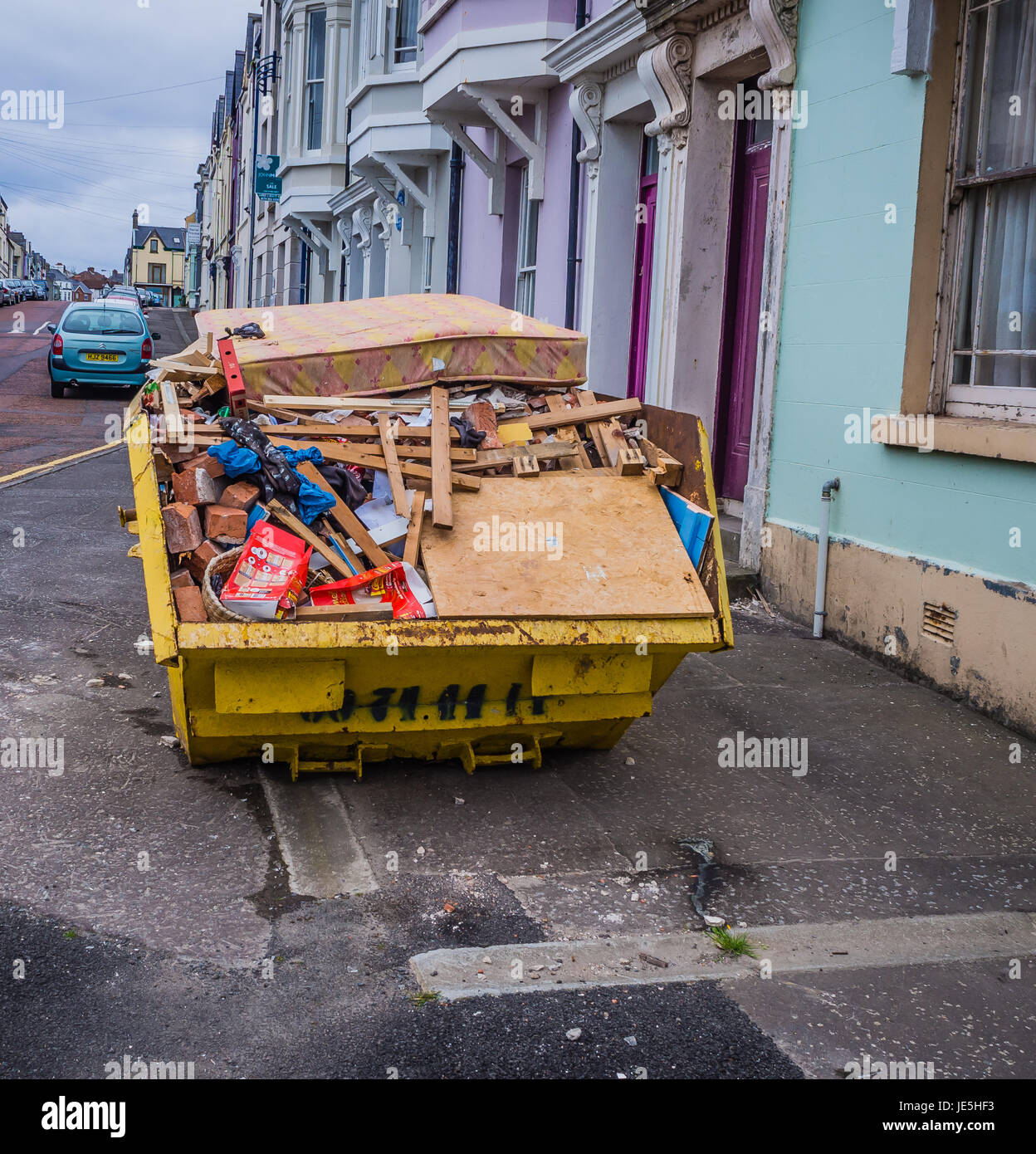 Skip - Household waste Stock Photo - Alamy