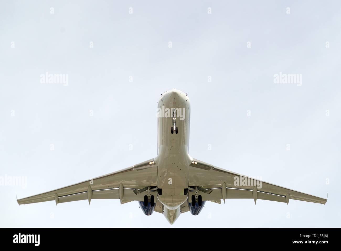 The underside of a modern airplane and its landing gear Stock Photo - Alamy